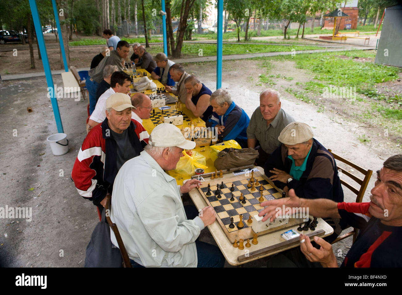 Rows of russian men playing chess in park, Ekaterinburg Russia Stock ...