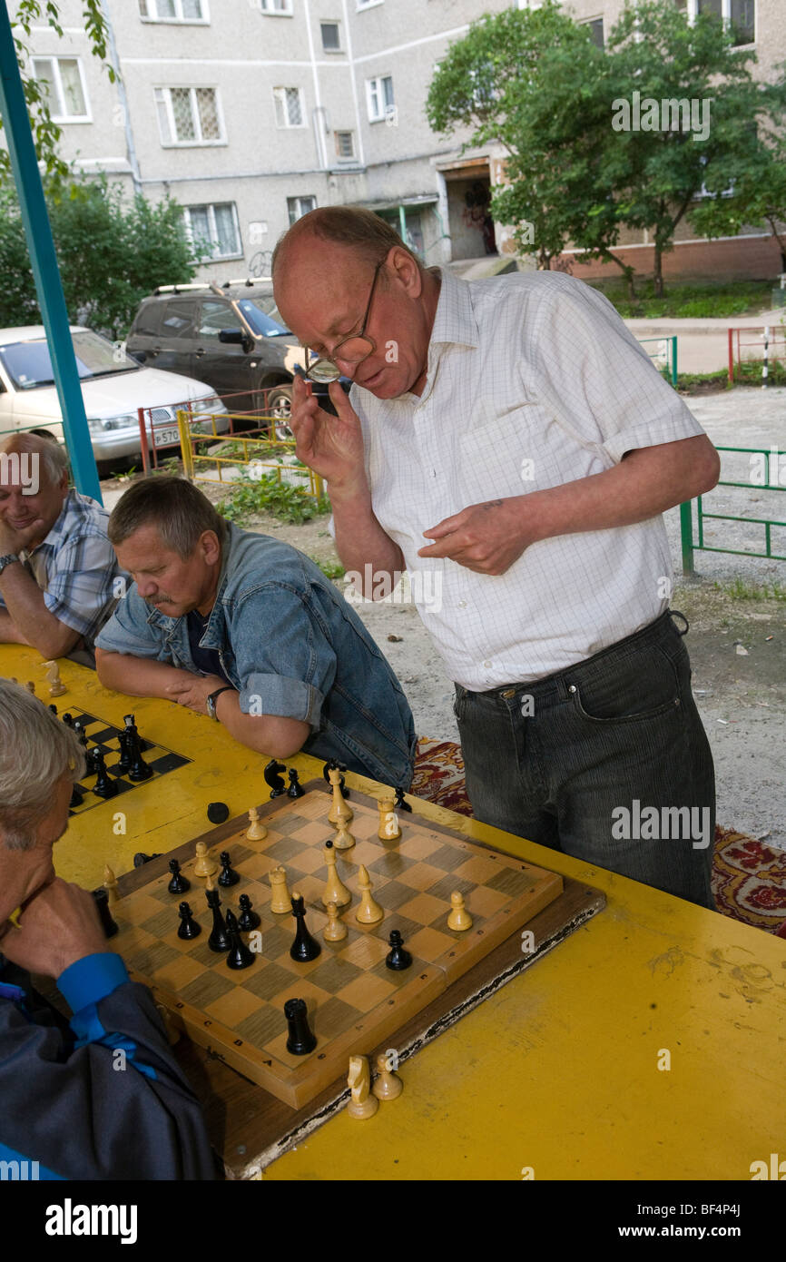 Senior men playing chess in park, Ekaterinberg, Russia Stock Photo - Alamy