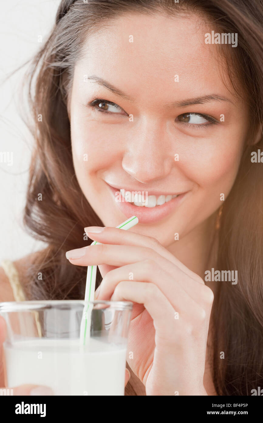 Woman drinking milk straw hi-res stock photography and images - Alamy