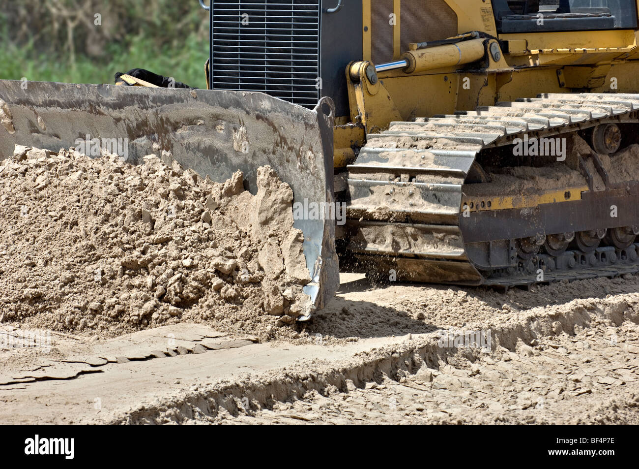 earthmoving construction equipment moving dirt Stock Photo - Alamy