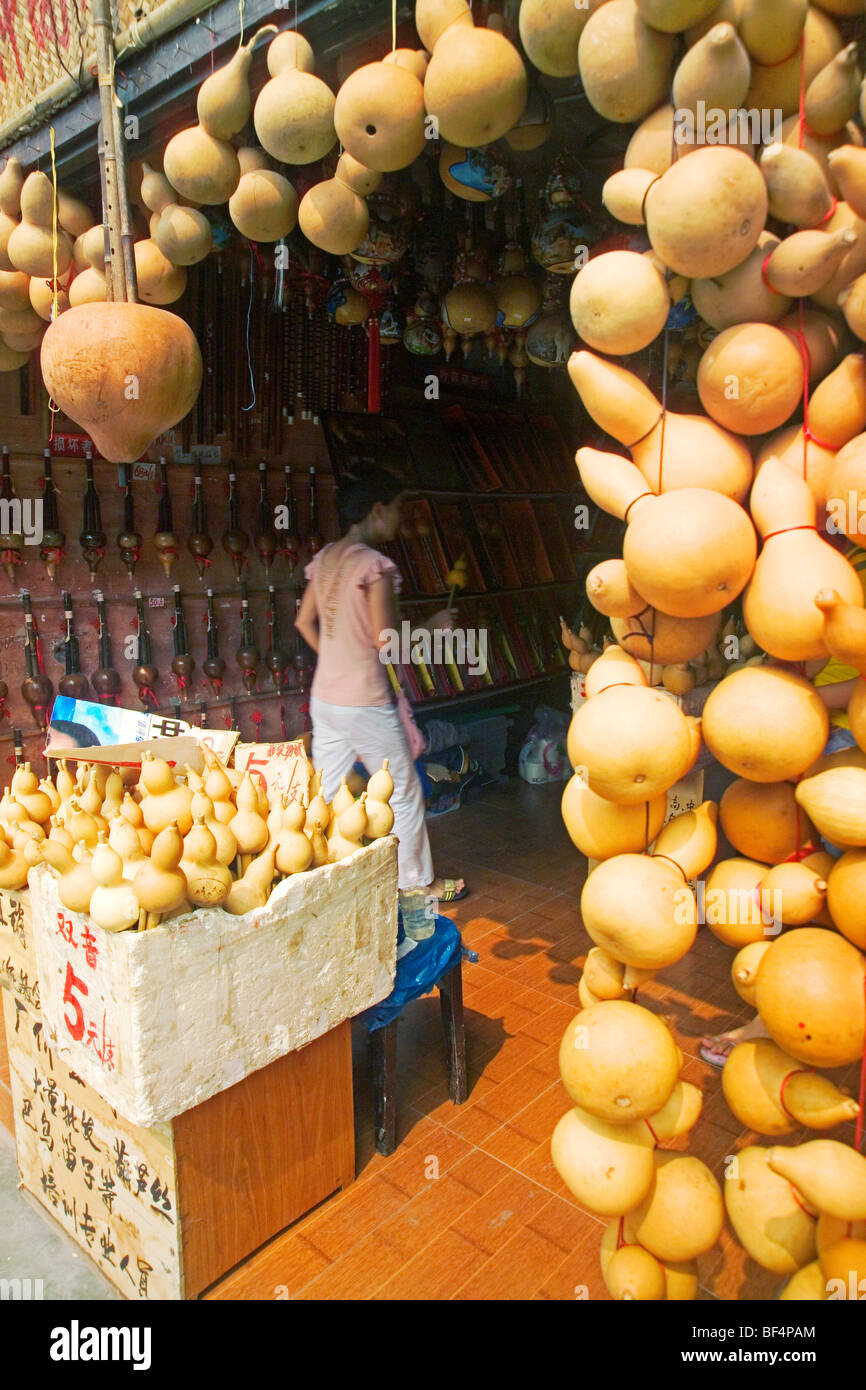Local store selling sun dried gourd and gourd flute, Ciqikou, Chongqing ...
