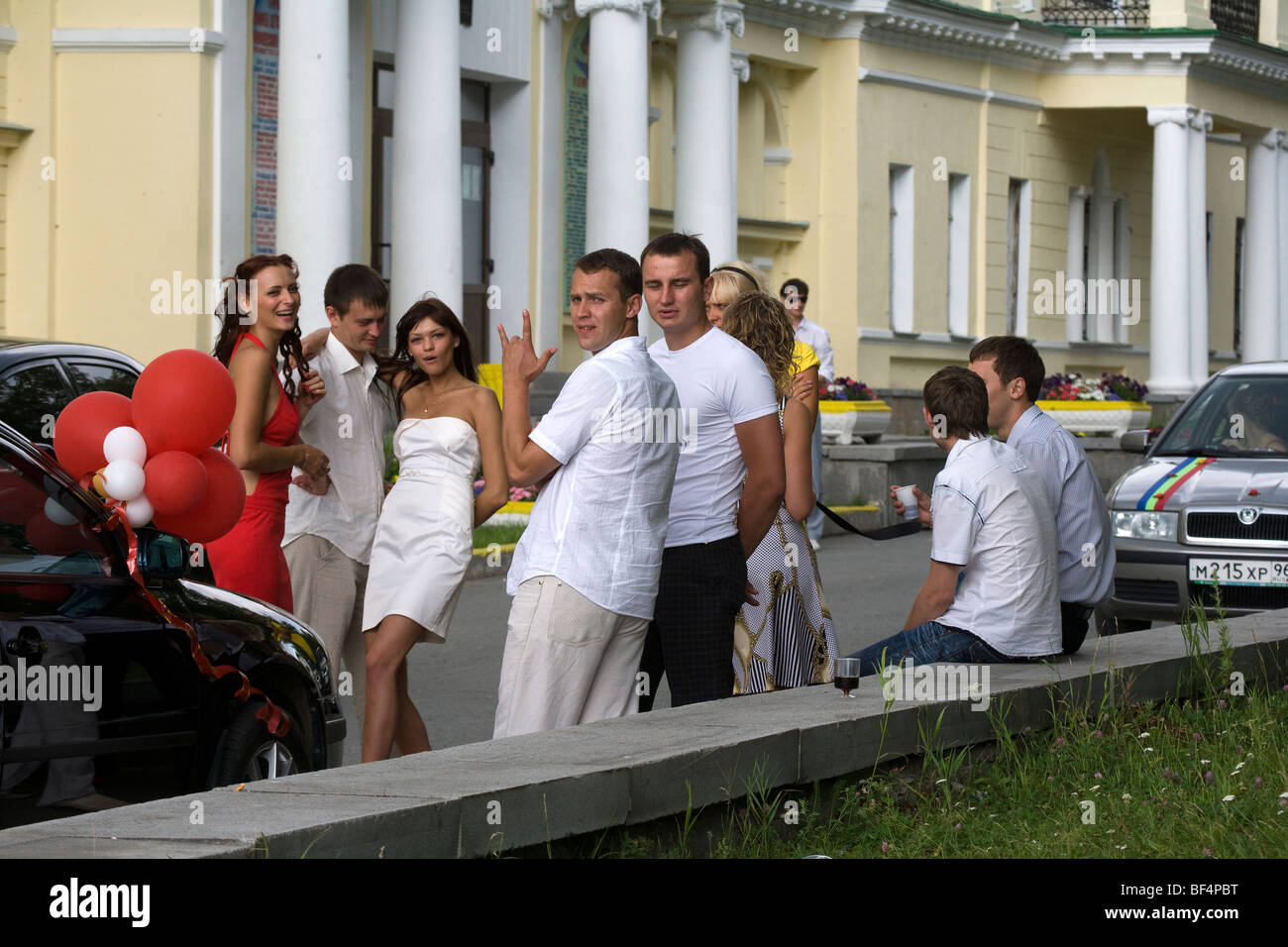 Guests of wedding socialising on street, Ekaterinberg, Russia Stock ...