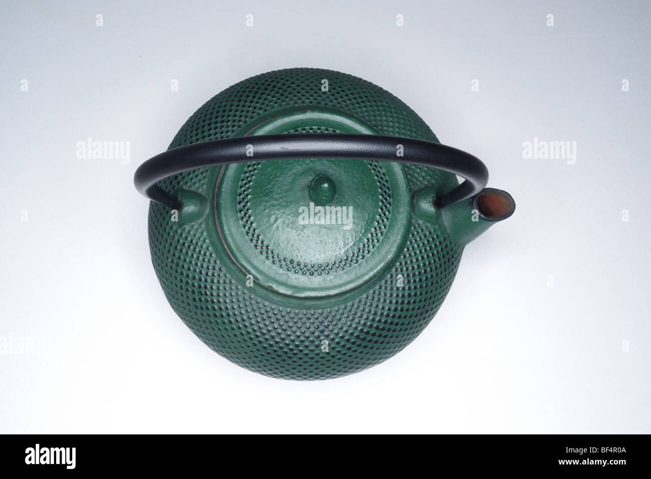 Cast iron teapot with pouring spout Stock Photo - Alamy