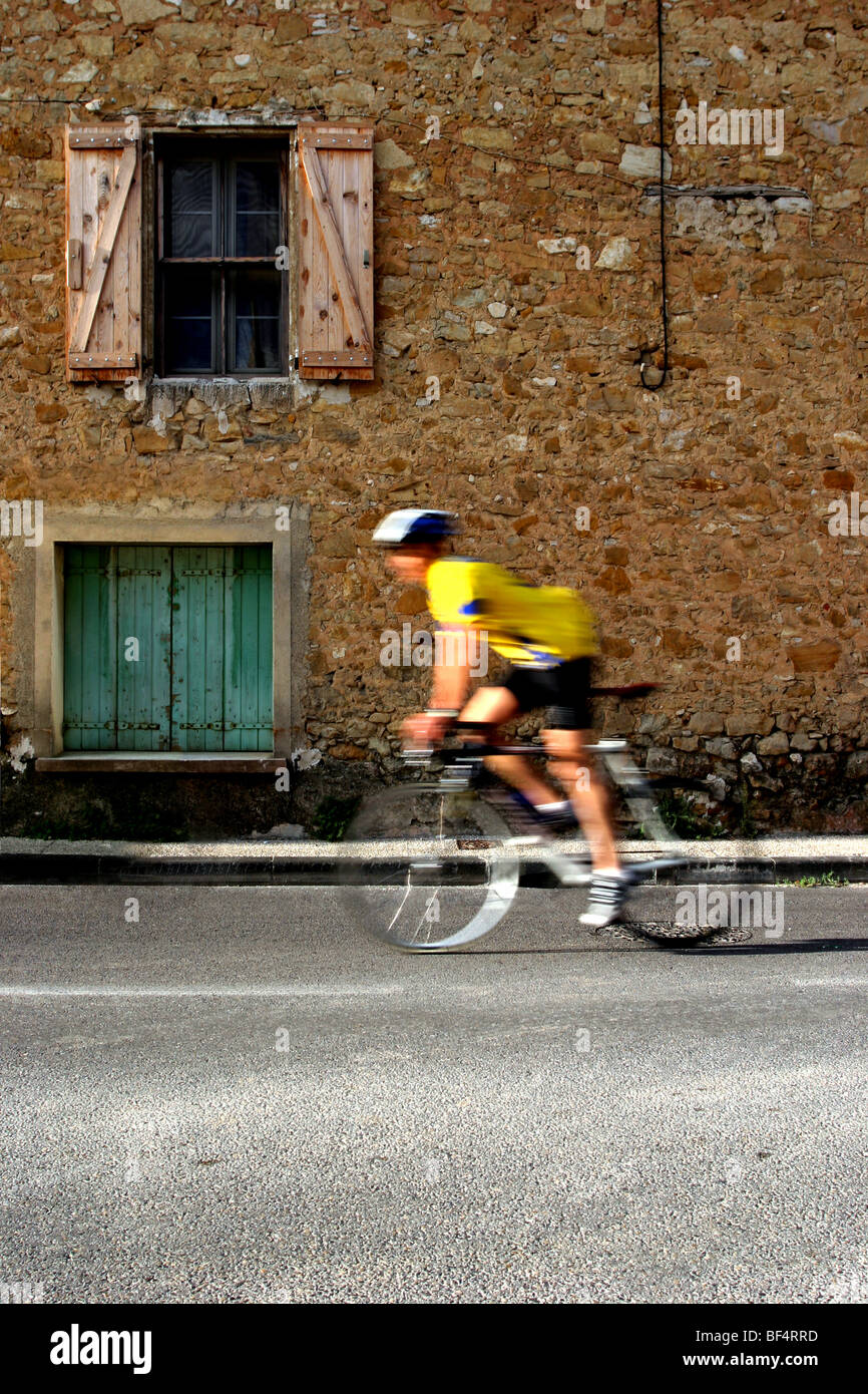 Cyclist in Bedoin, Provence - France Stock Photo - Alamy