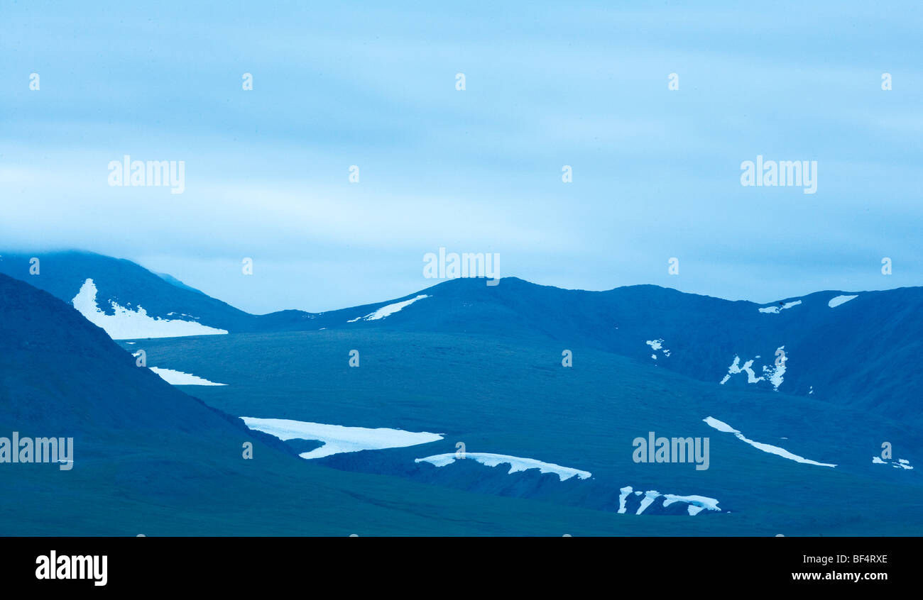 Snow lying in mountain landscape at dawn, Polyarny, Urals, Arctic ...