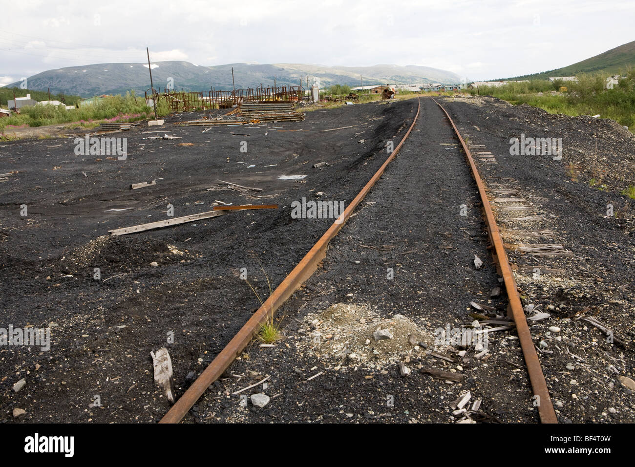 Abandoned rusting railway track near village, Polyarny, Arctic Russia ...