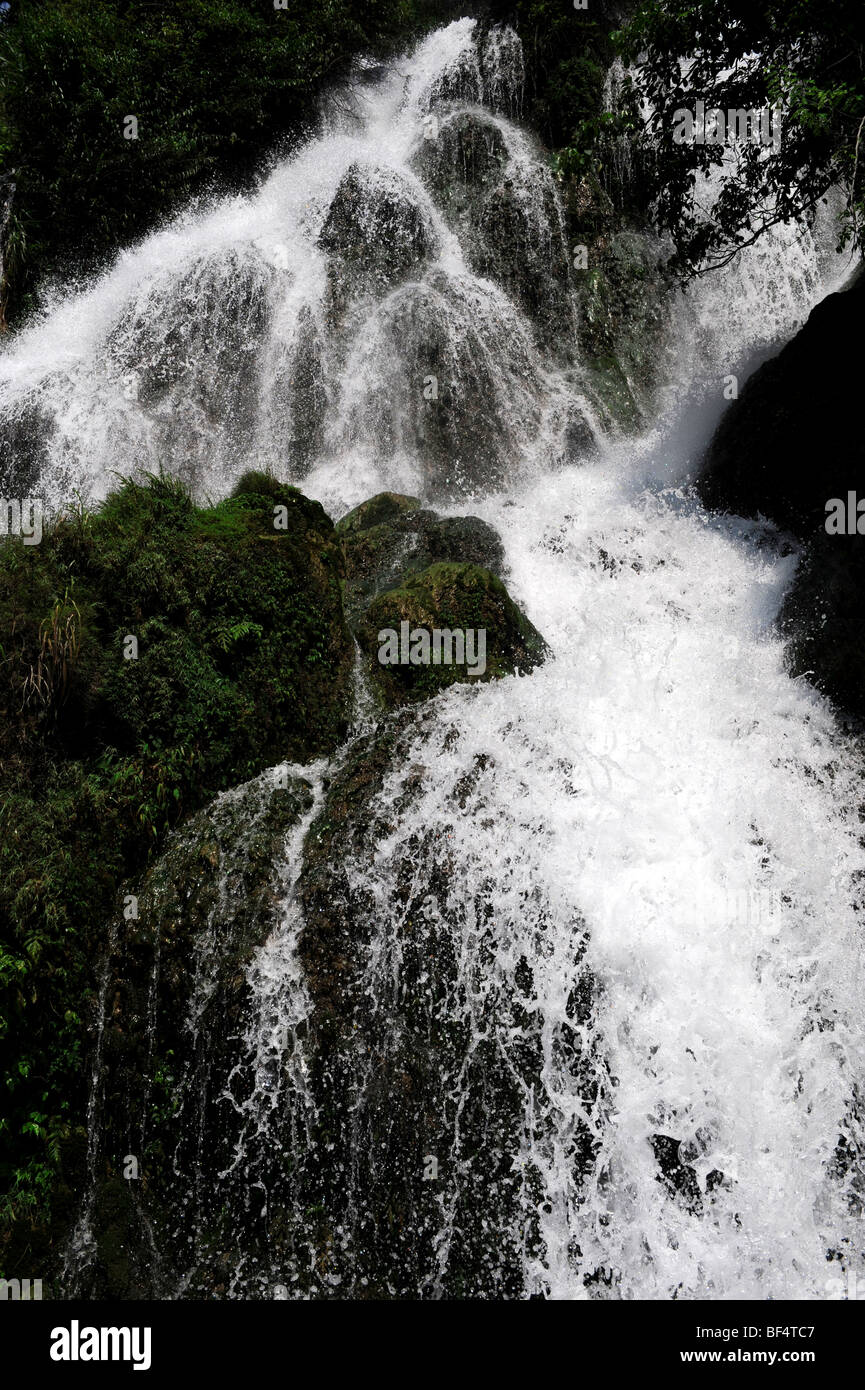 Water flow over moss covered rocks, Libo County, Qiannan Buyei and Miao ...