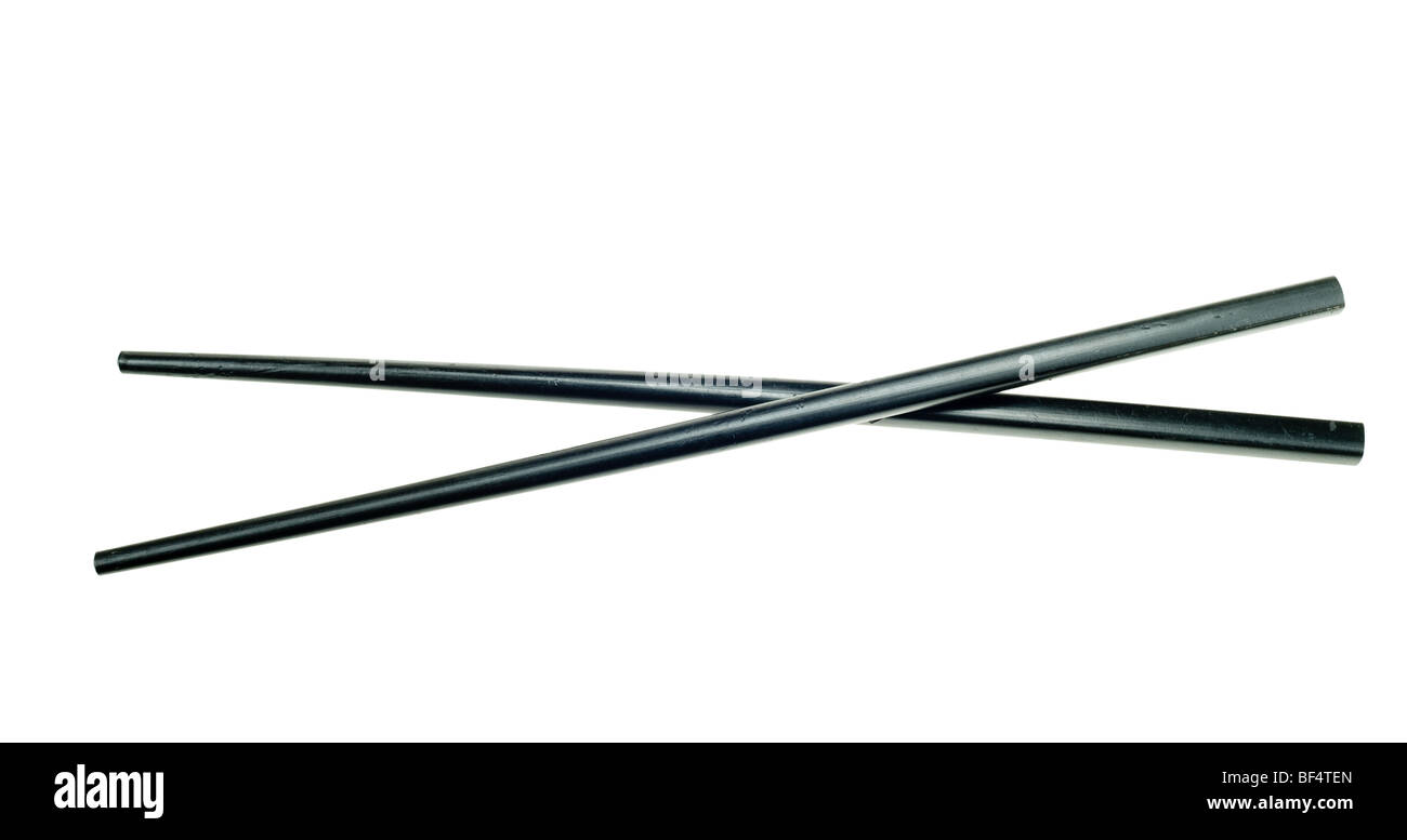 black chop sticks isolated on a white background Stock Photo - Alamy