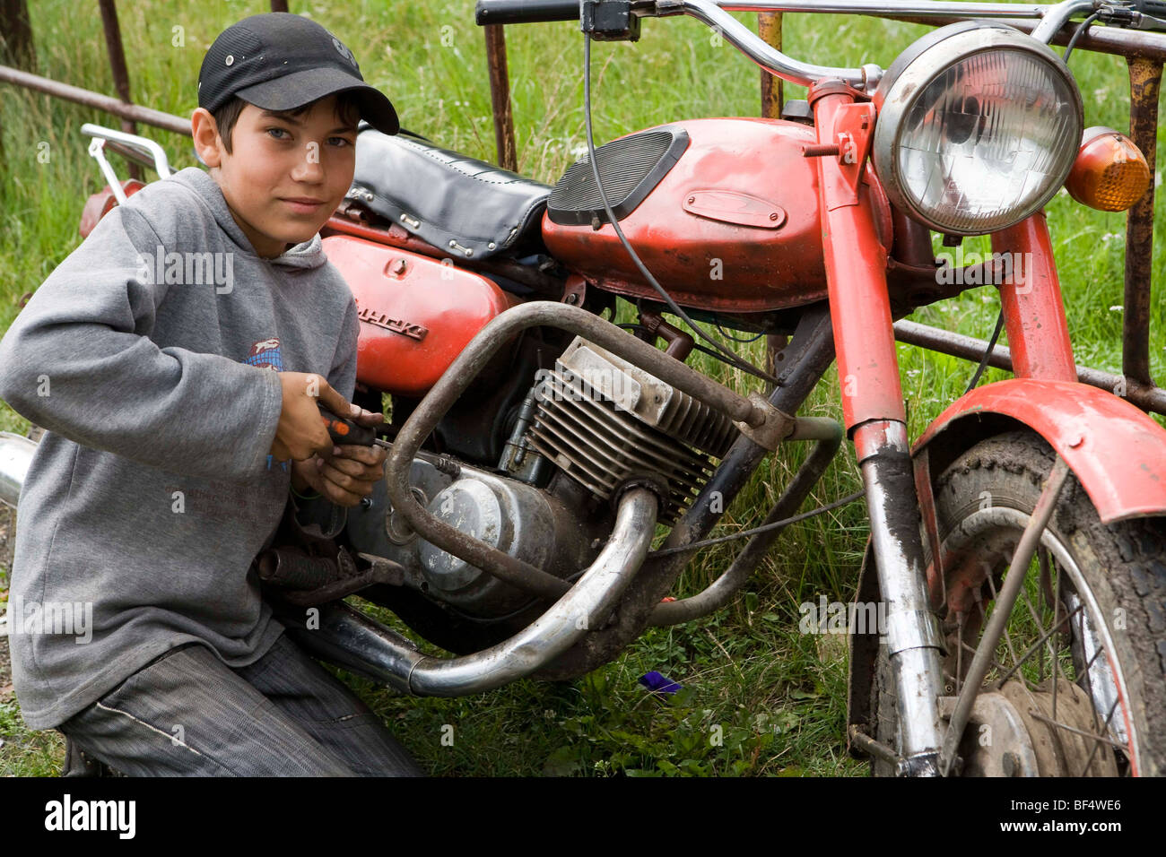 Boy on motorcycle hi-res stock photography and images - Alamy