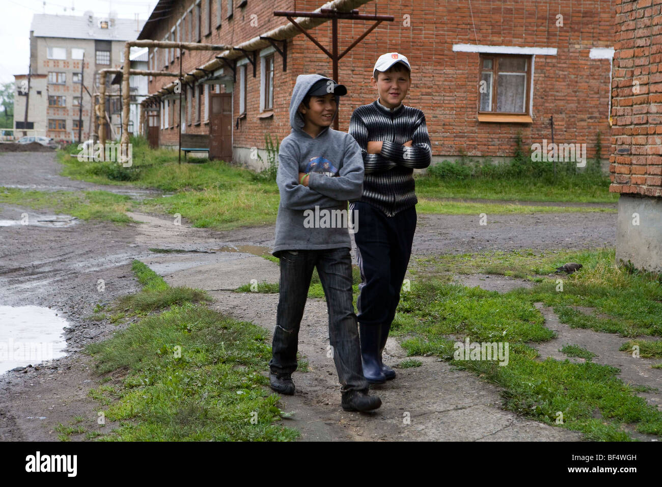 Boy walking in in rural town, Ural, Russia Stock Photo - Alamy