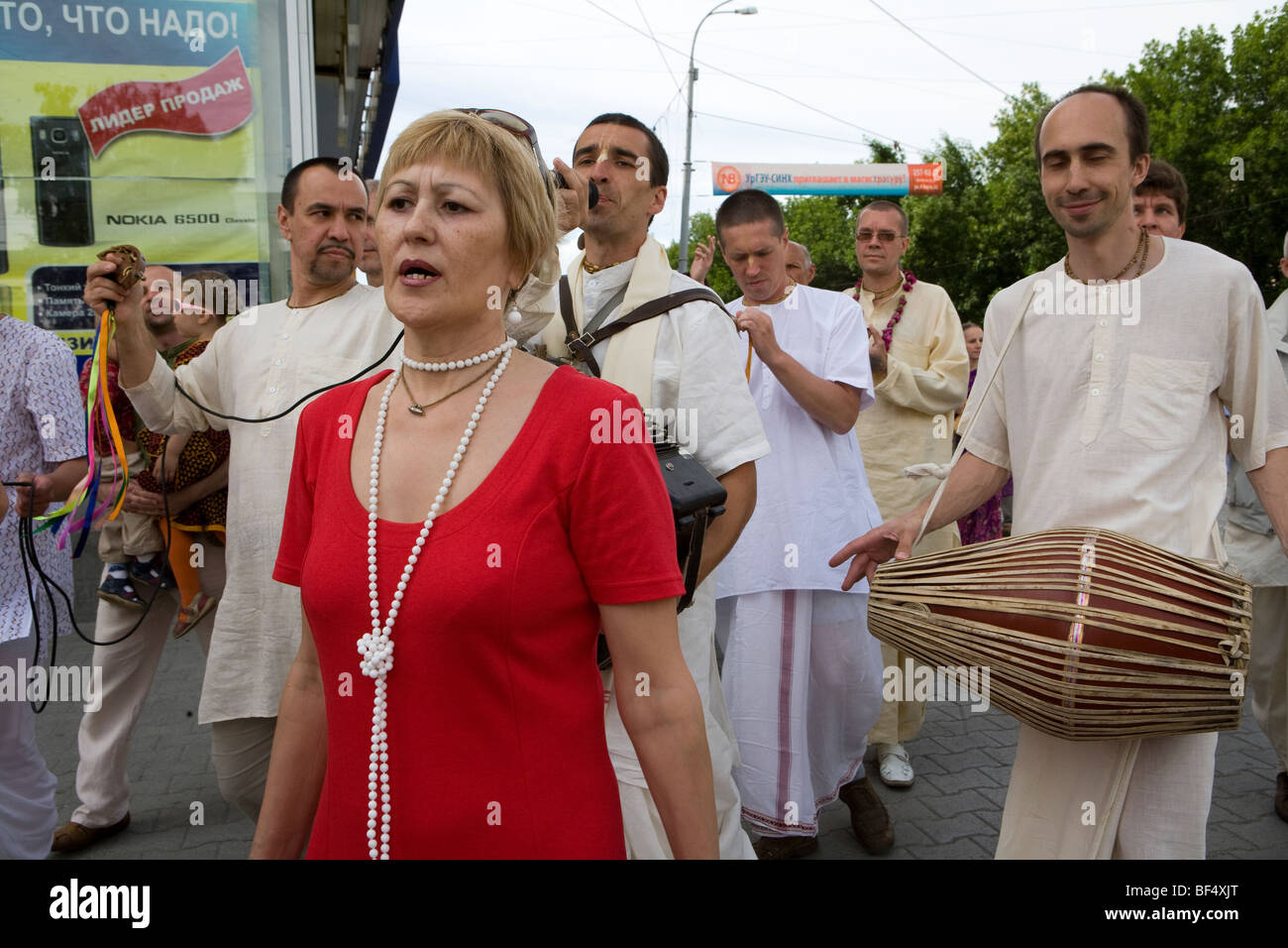 Hare krishna woman chanting hi-res stock photography and images - Alamy