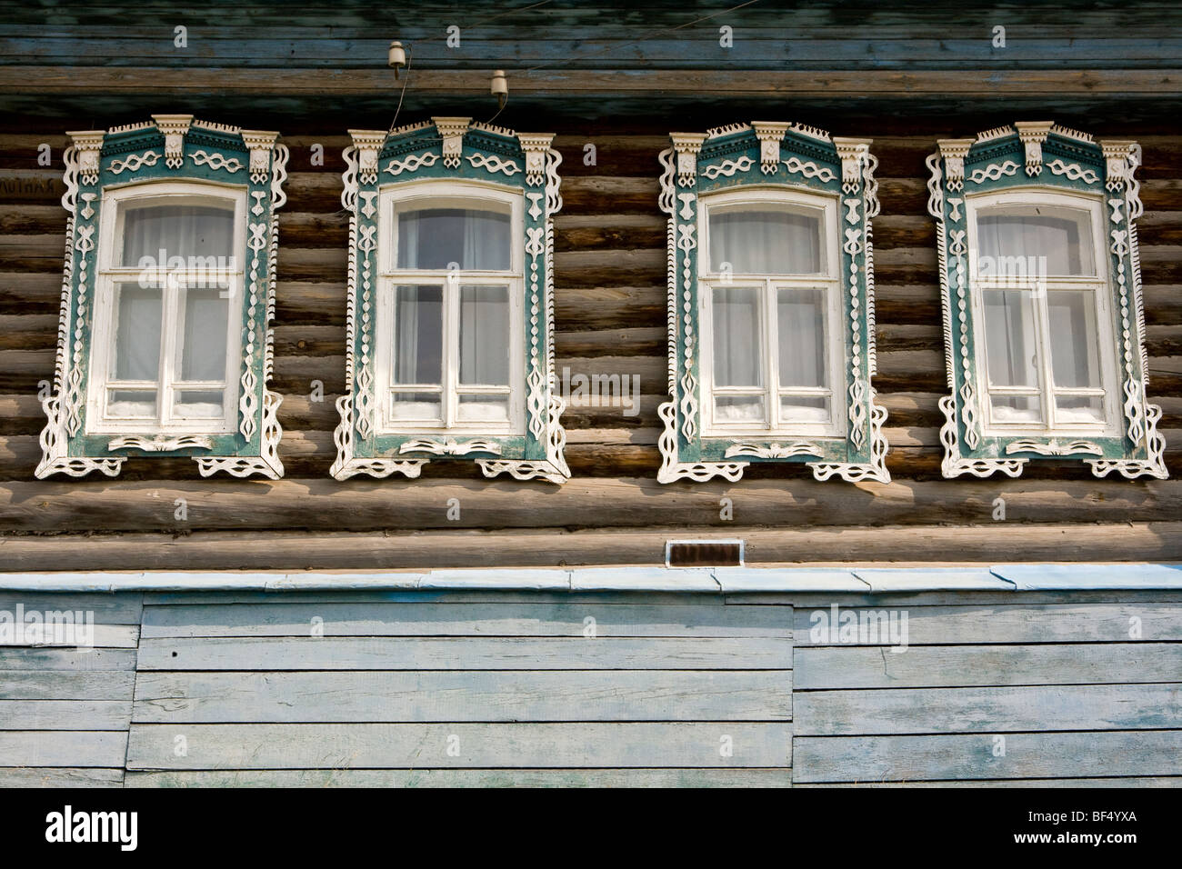 Windows in traditional wooden building, Russia Stock Photo - Alamy