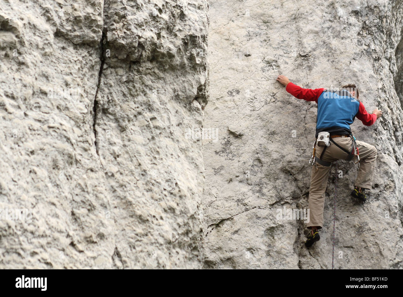 Rock climber climbing on limestone cliff. Poland Stock Photo - Alamy