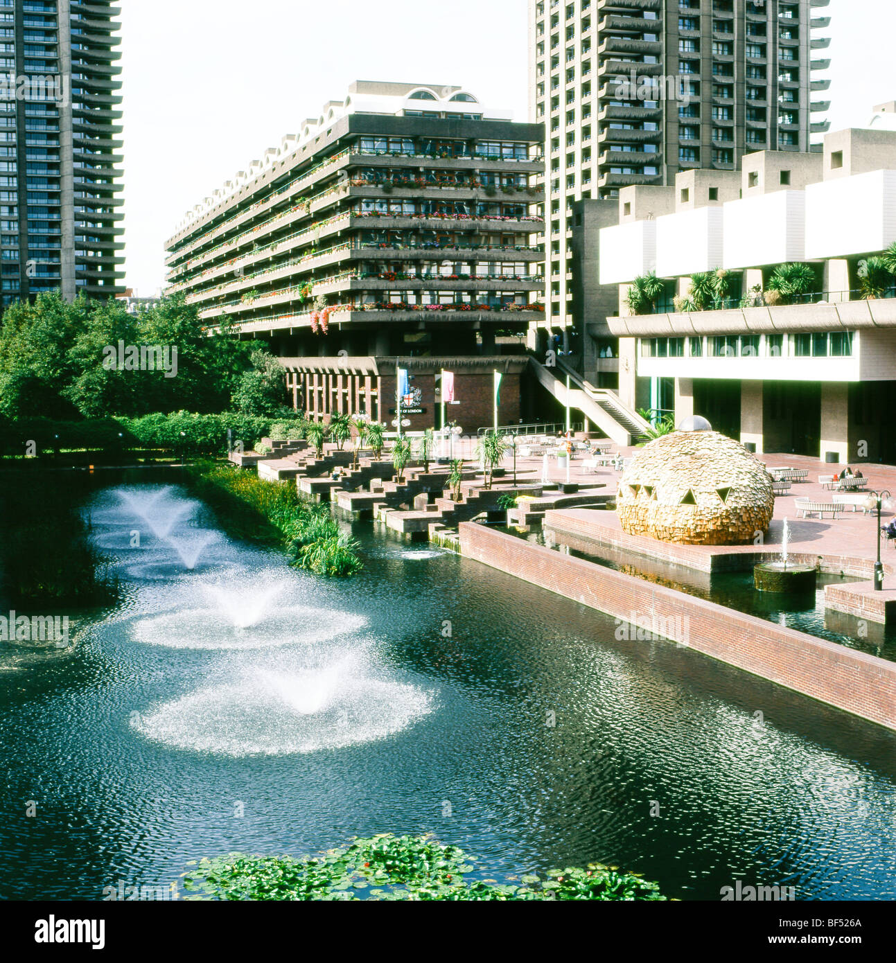 A view over the Barbican Art Centre complex and lakeside terrace water ...