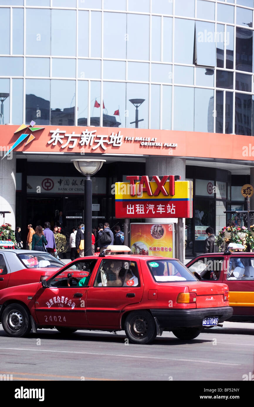 Taxi stop in front of Oriental Plaza, Wangfujing, Beijing, China Stock ...