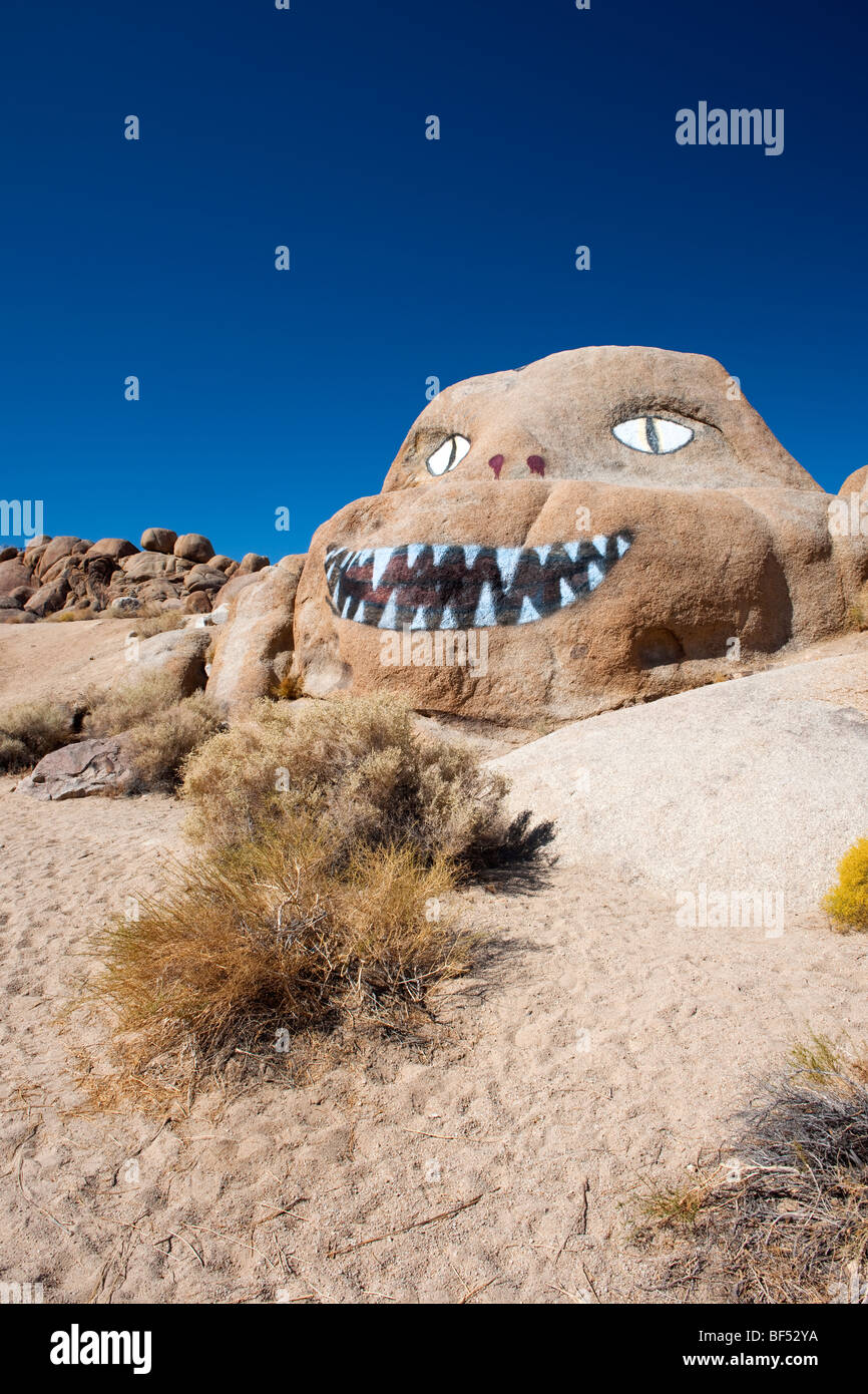 Painted "rock monster" on a large boulder near California's Alabama ...