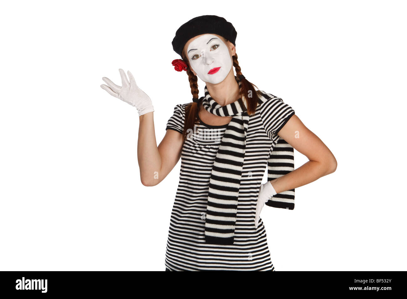 Portrait of a young lady dressed up as a mime isolated on white ...