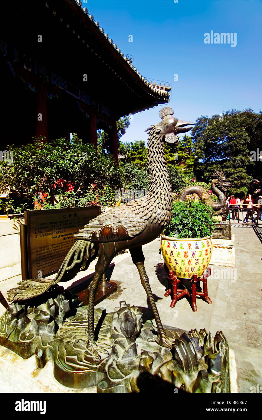 Bronze phoenix statue in front of Hall of Benevolence and Longevity ...