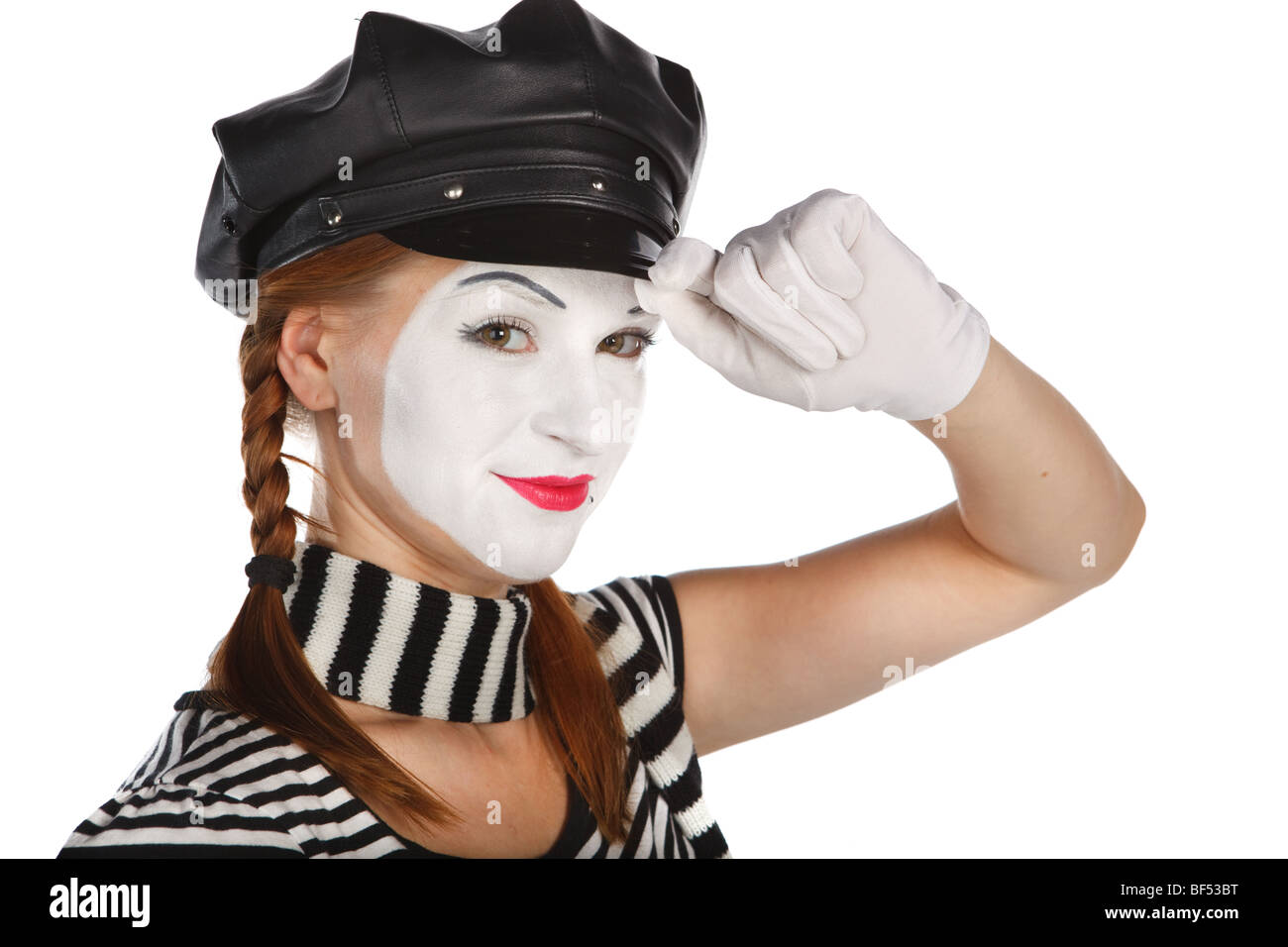 Portrait of a young lady dressed up as a mime isolated on white ...