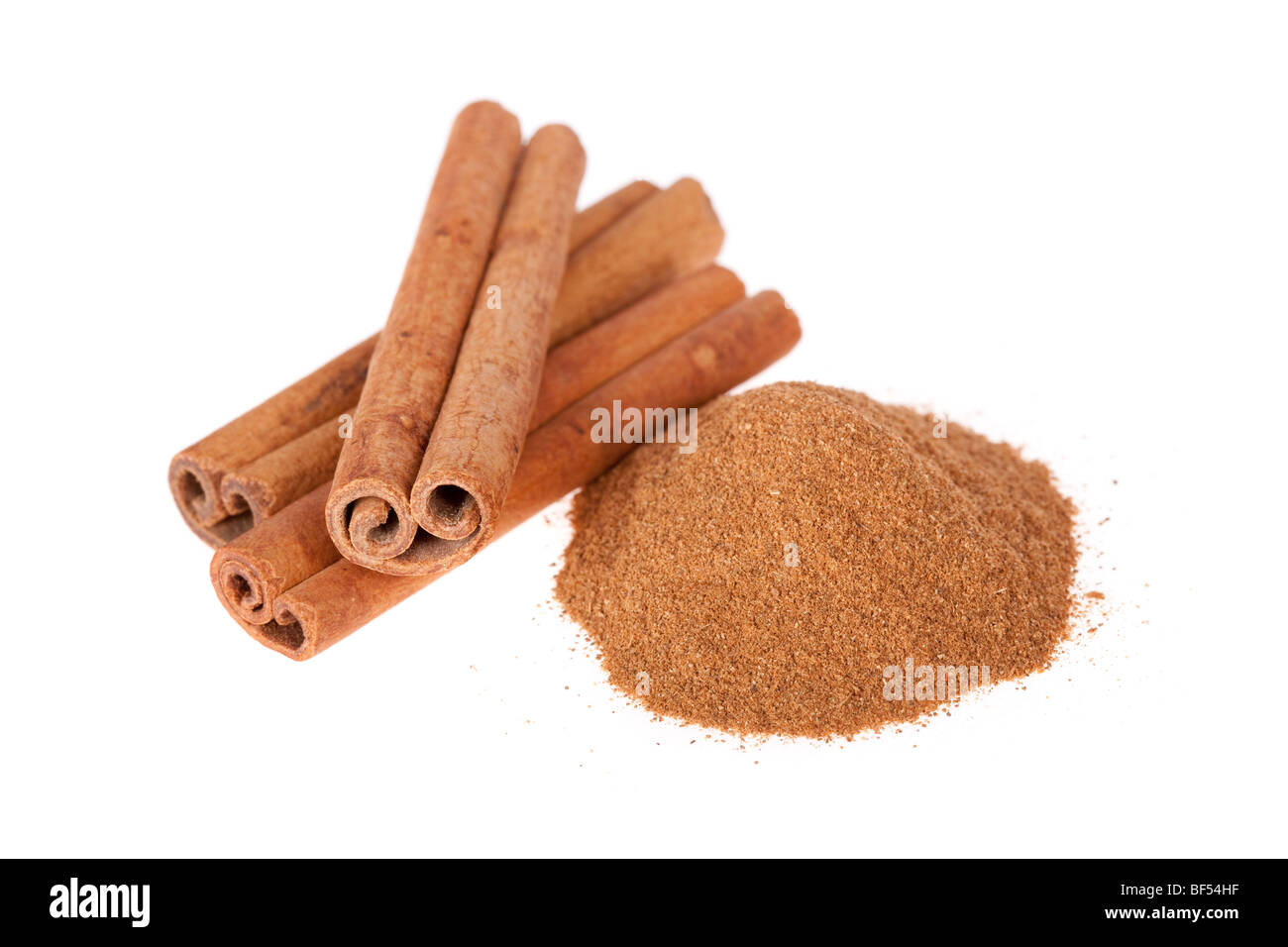 Ground cinnamon and sticks isolated on a white background Stock Photo ...