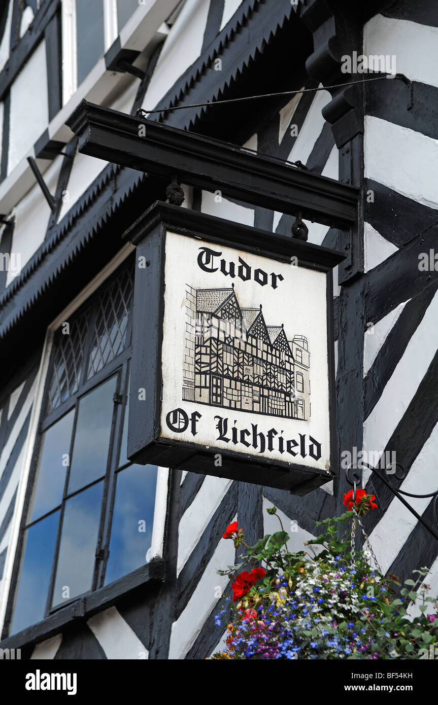 Old pub sign, Tudor of Lichfield, on a half-timbered Tudor-style house ...