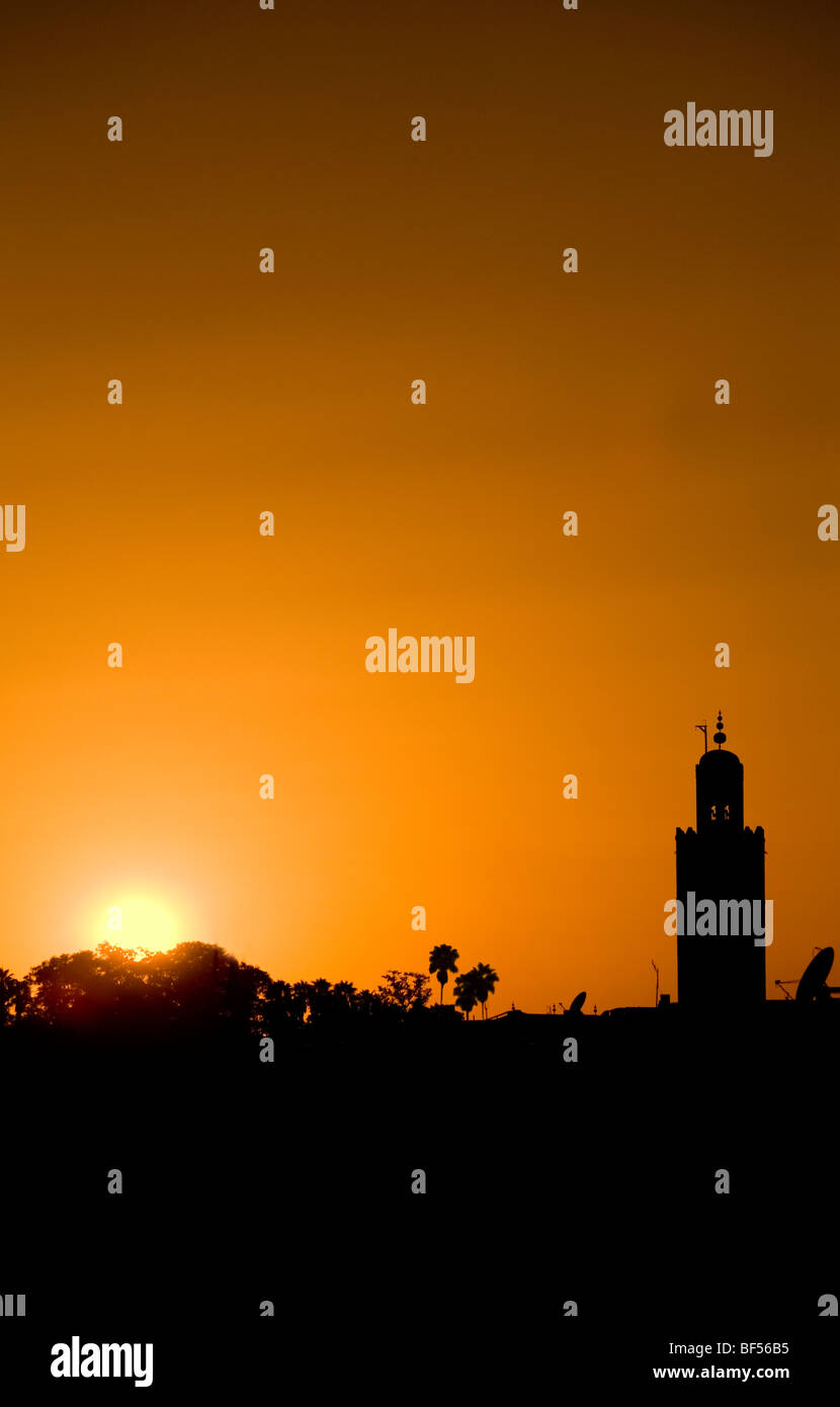 a orange sunset over the marrakesh skyline in morocco Stock Photo - Alamy