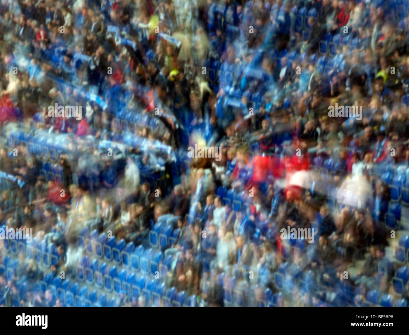 Crowd of football fans sitting on chairs t the stadium Stock Photo - Alamy