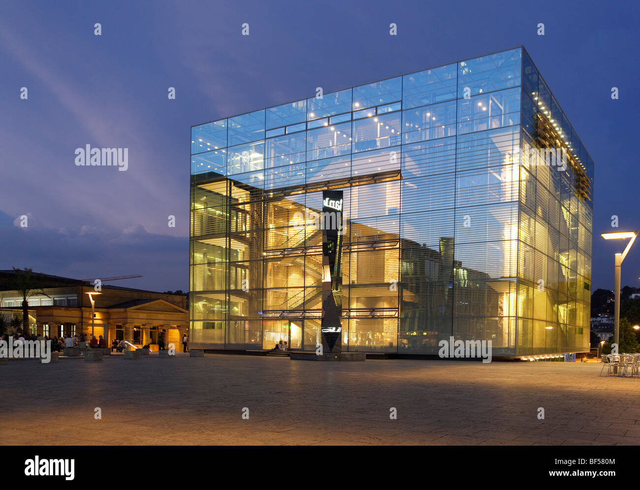 Illuminated Kunstmuseum at little castle square in the evening, Stuttgart, Baden-Wurttemberg ...