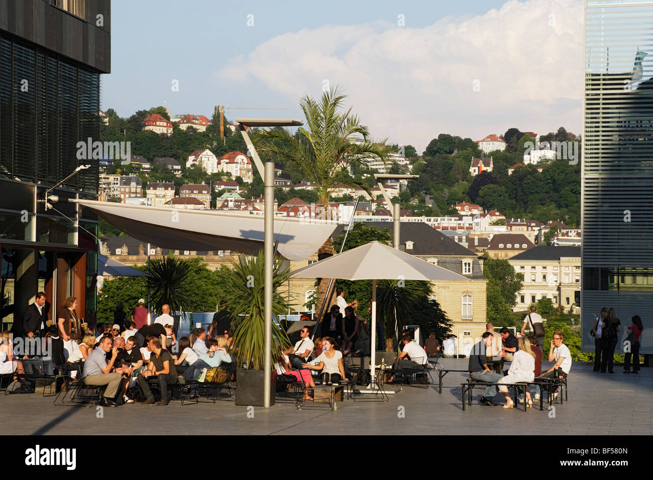 People sitting in a bar at little castle square, Stuttgart, Baden ...