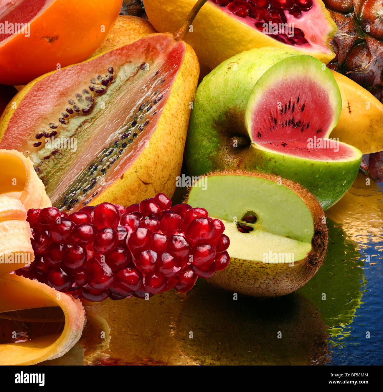 Concept photo of the modified fruits on a mirror Stock Photo - Alamy