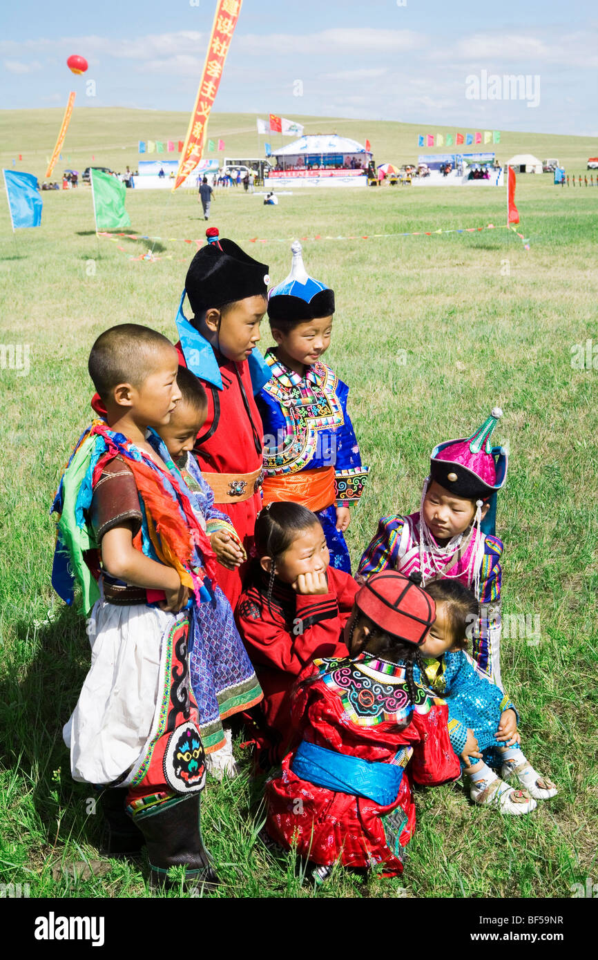 Mongolian children in traditional costume, Xilamuren Grassland, Baotou ...