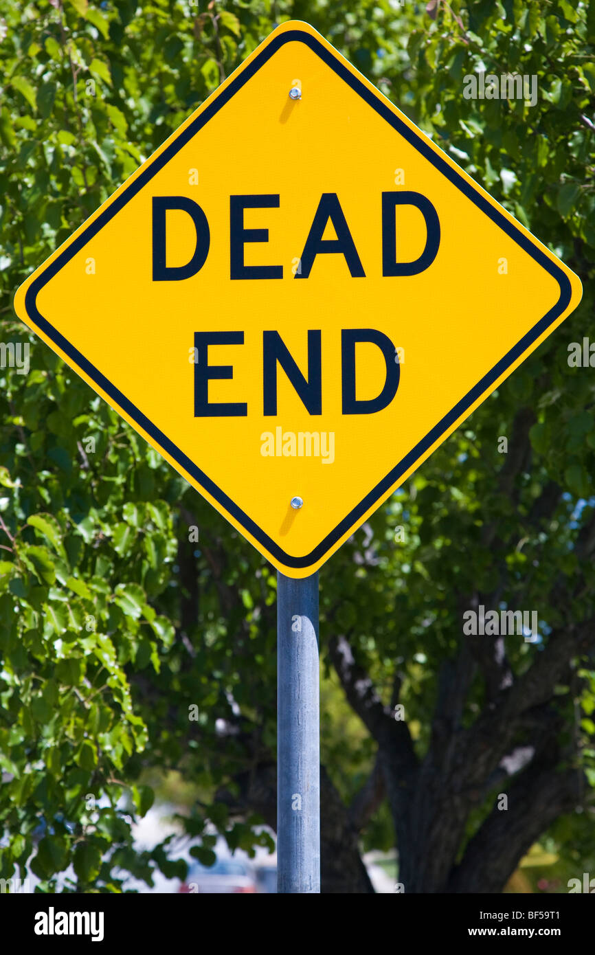 A yellow dead end sign on pole Stock Photo - Alamy