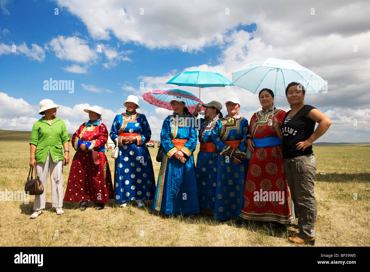 Tourists in Mongolian traditional costume, Xilamuren Grassland, Baotou ...
