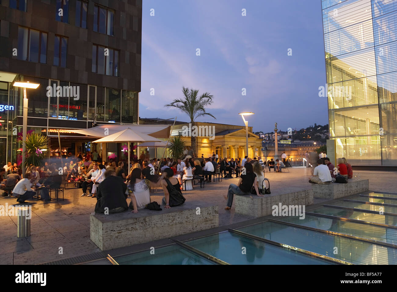 People sitting in a bar near Kunstmuseum at little castle square ...