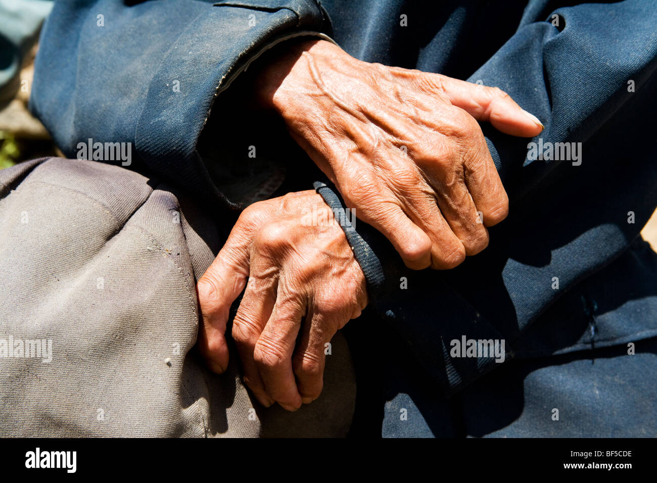 Hands of an old man, Sichuan Province, China Stock Photo - Alamy