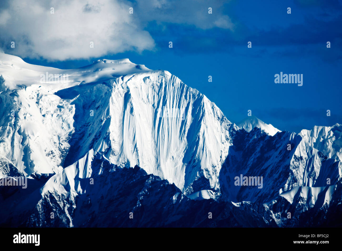 Snow covered peak of Gongga Snow Mountain, Sichuan Province, China ...