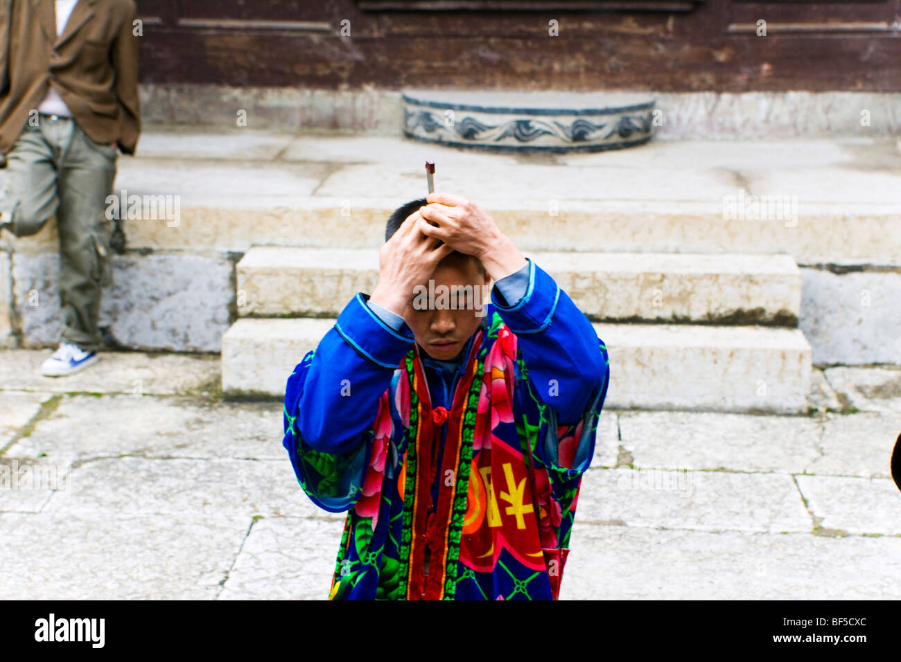 Nuo Opera actor drilling a hole on his scalp during ritual before ...