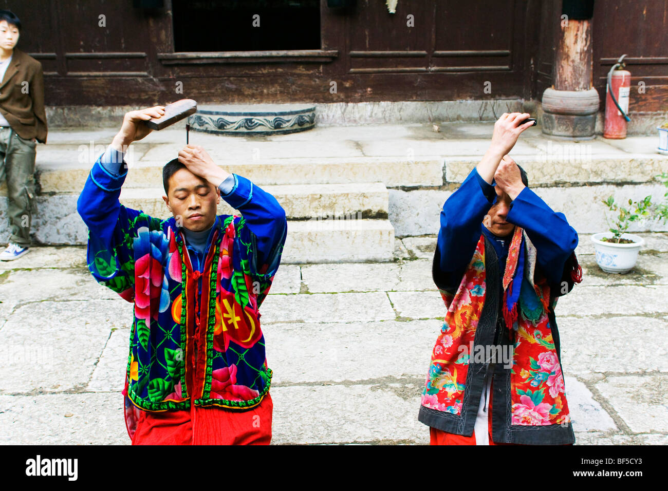 Nuo Opera actors drilling a hole on his scalp during ritual before ...