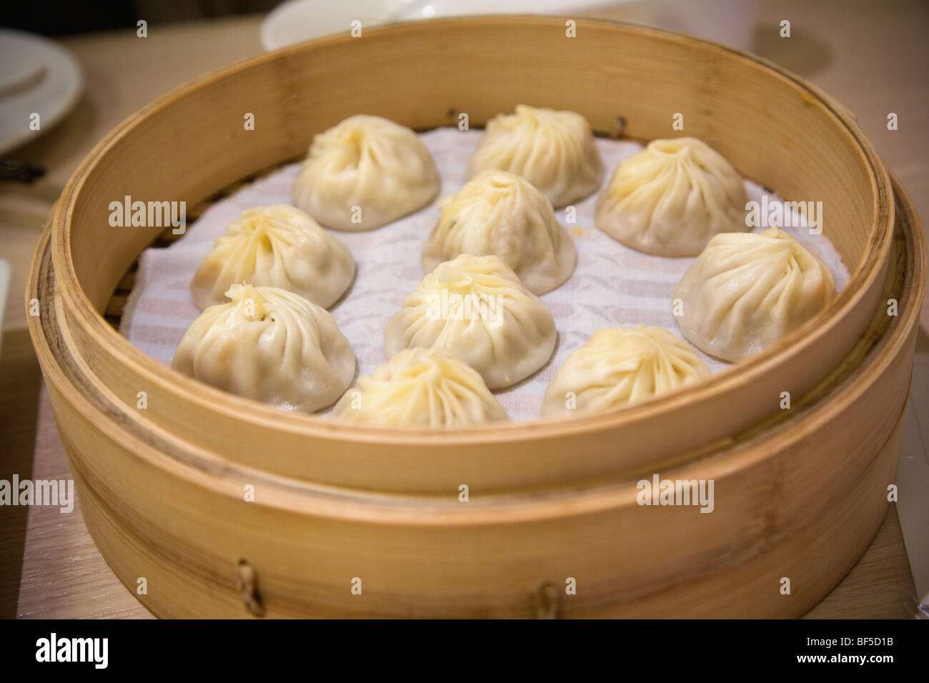 Xiao Long Bao Aka Shanghai Soup Dumplings In A Bamboo Steamer Basket