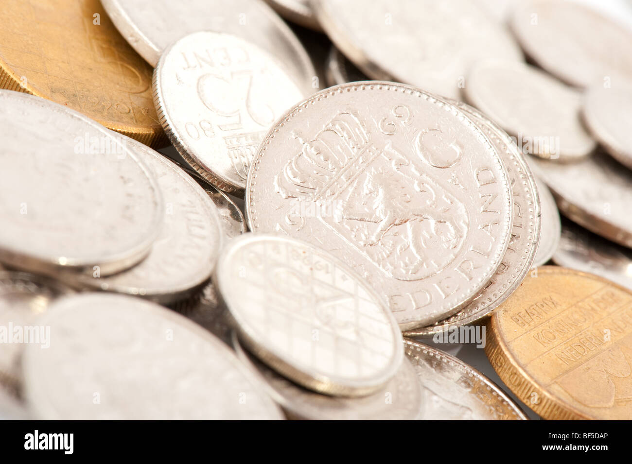 Old Dutch guilders in different value isolated over white Stock Photo ...