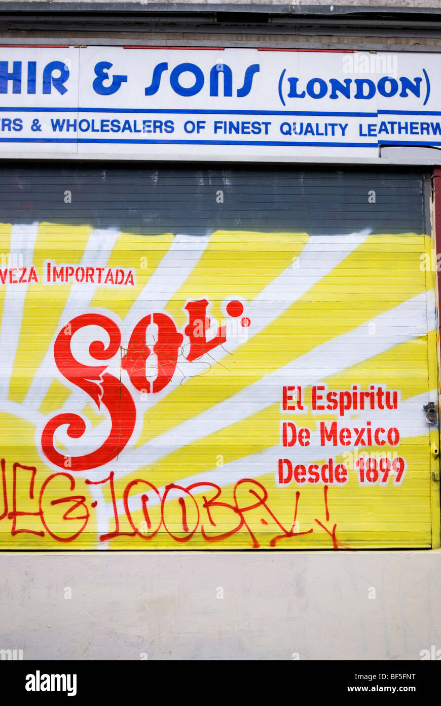SOL painting on the shutter, Brick Lane in East End, East London ...