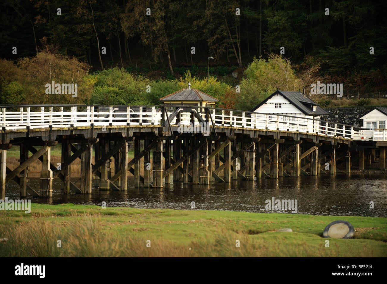 The old wooden privately owned toll bridge at Penmaenpool, Mawddach ...
