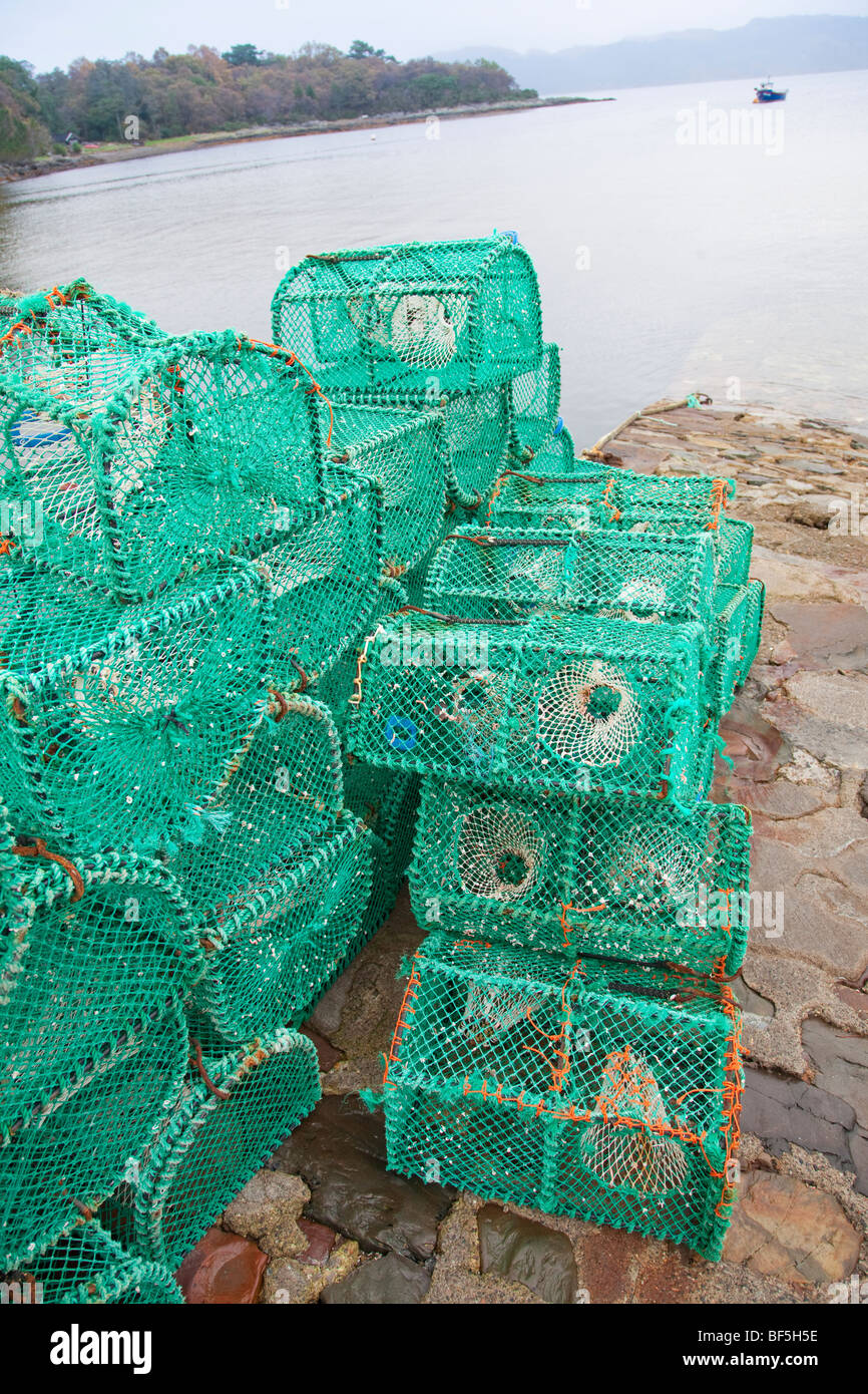 Stack of lobster or crab pots on the quayside Stock Photo - Alamy