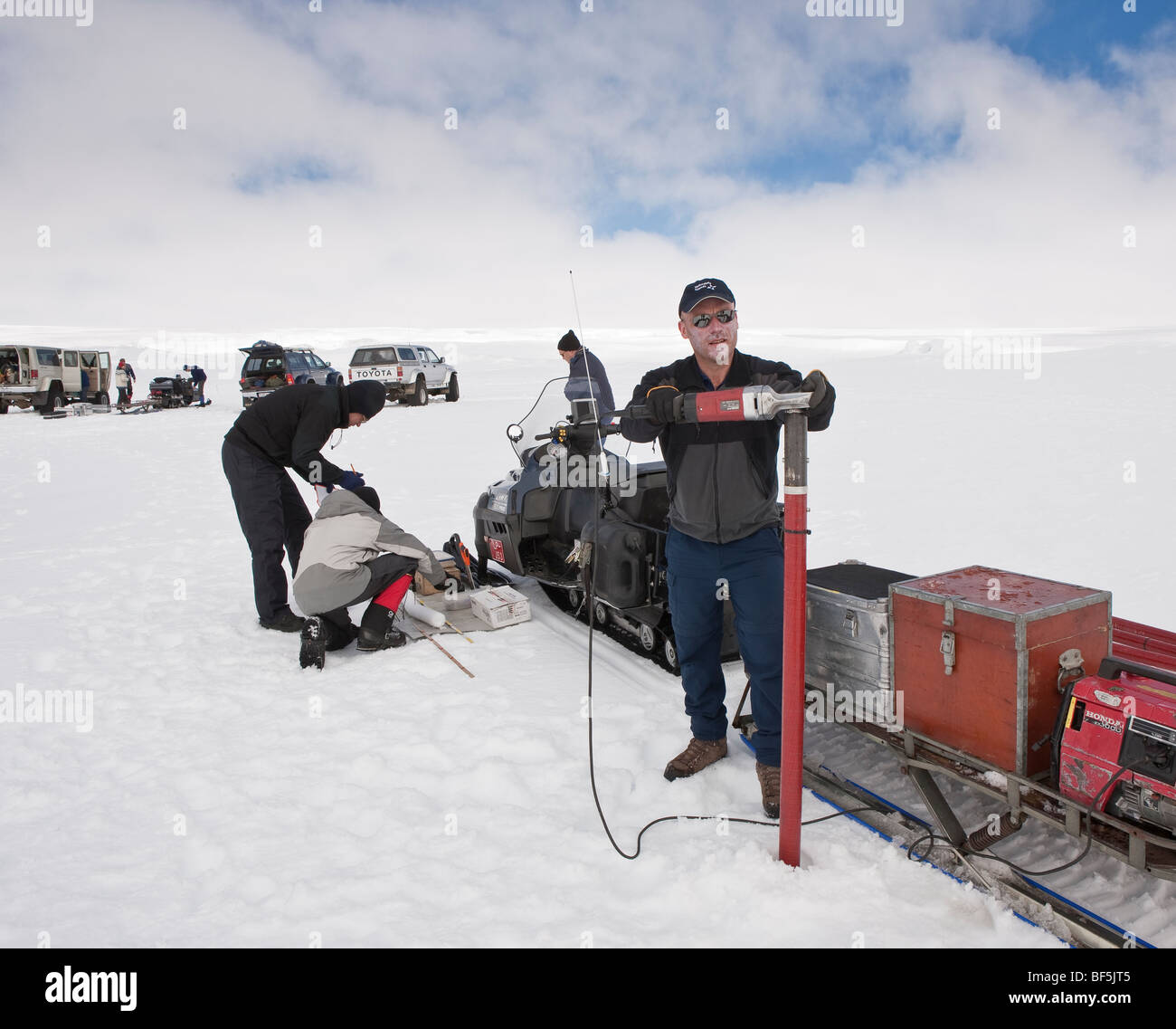 Scientist drilling for ice cores on Vatnajokull glacier, Iceland Stock ...