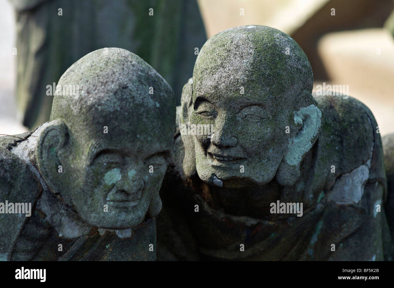 Stone faces at a Temple Stock Photo - Alamy