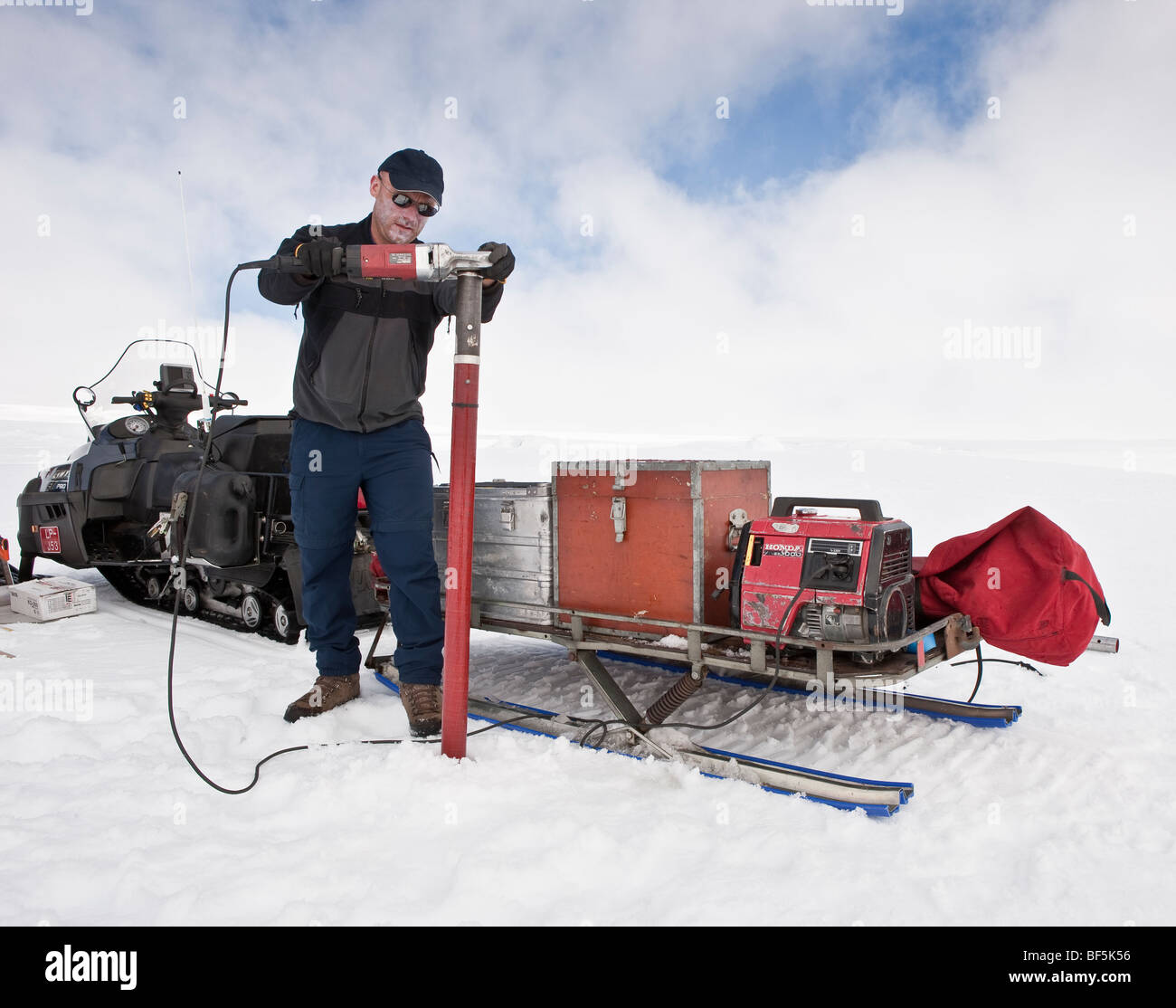 Scientist drilling for ice cores on Vatnajokull glacier, Iceland Stock ...