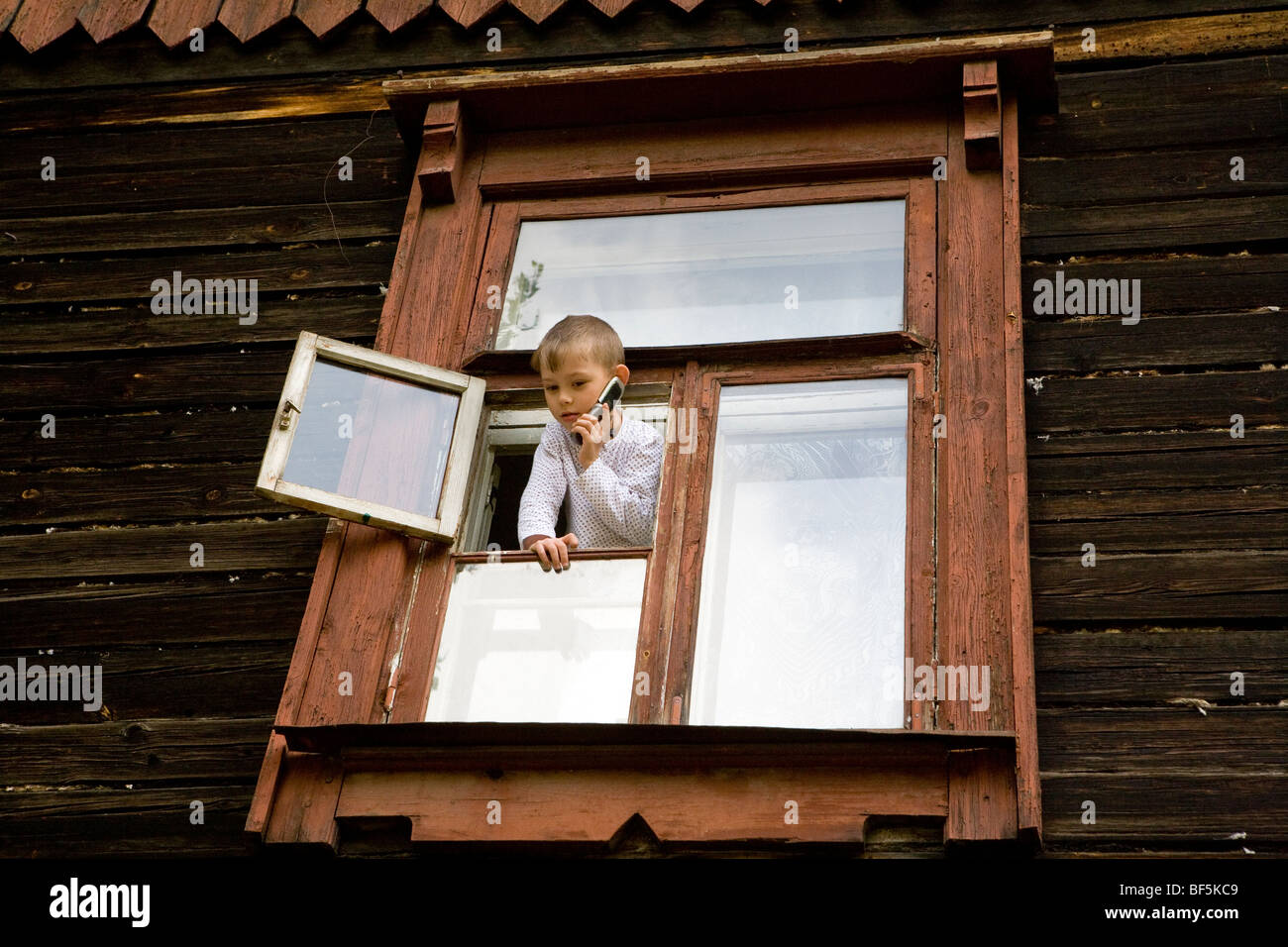 Boy leaning forward hi-res stock photography and images - Alamy