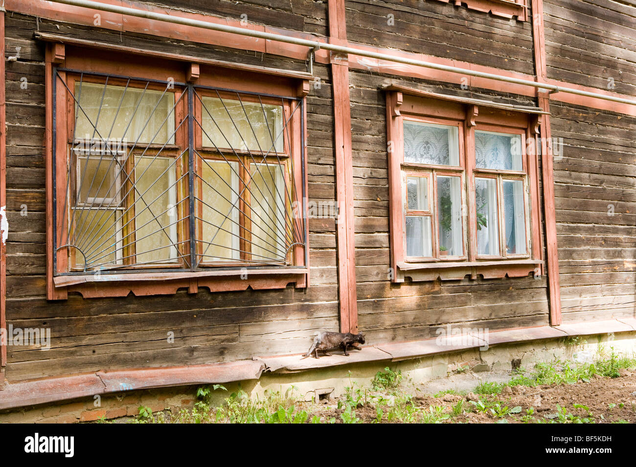 Windows on facade of traditional wooden buildings, Ural Mash ...
