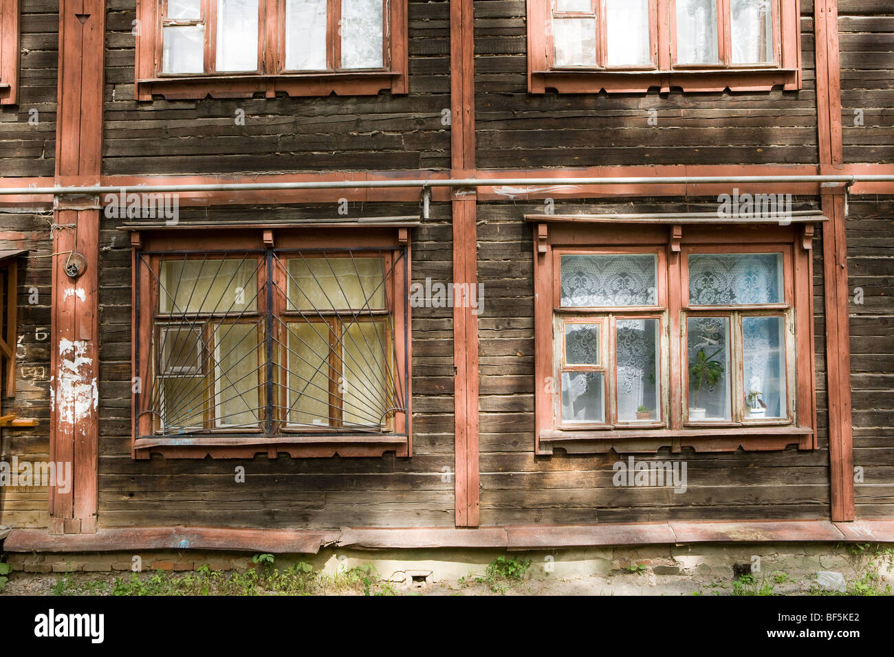 Windows on facade of traditional wooden buildings, Ural Mash ...