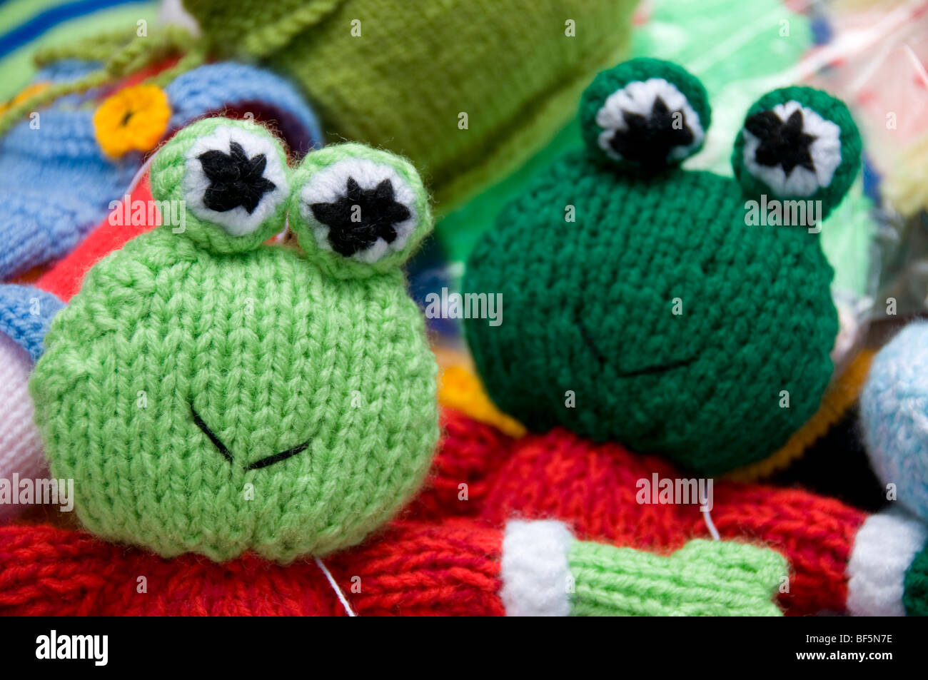 Knitted gifts on a summer fete stall Stock Photo - Alamy